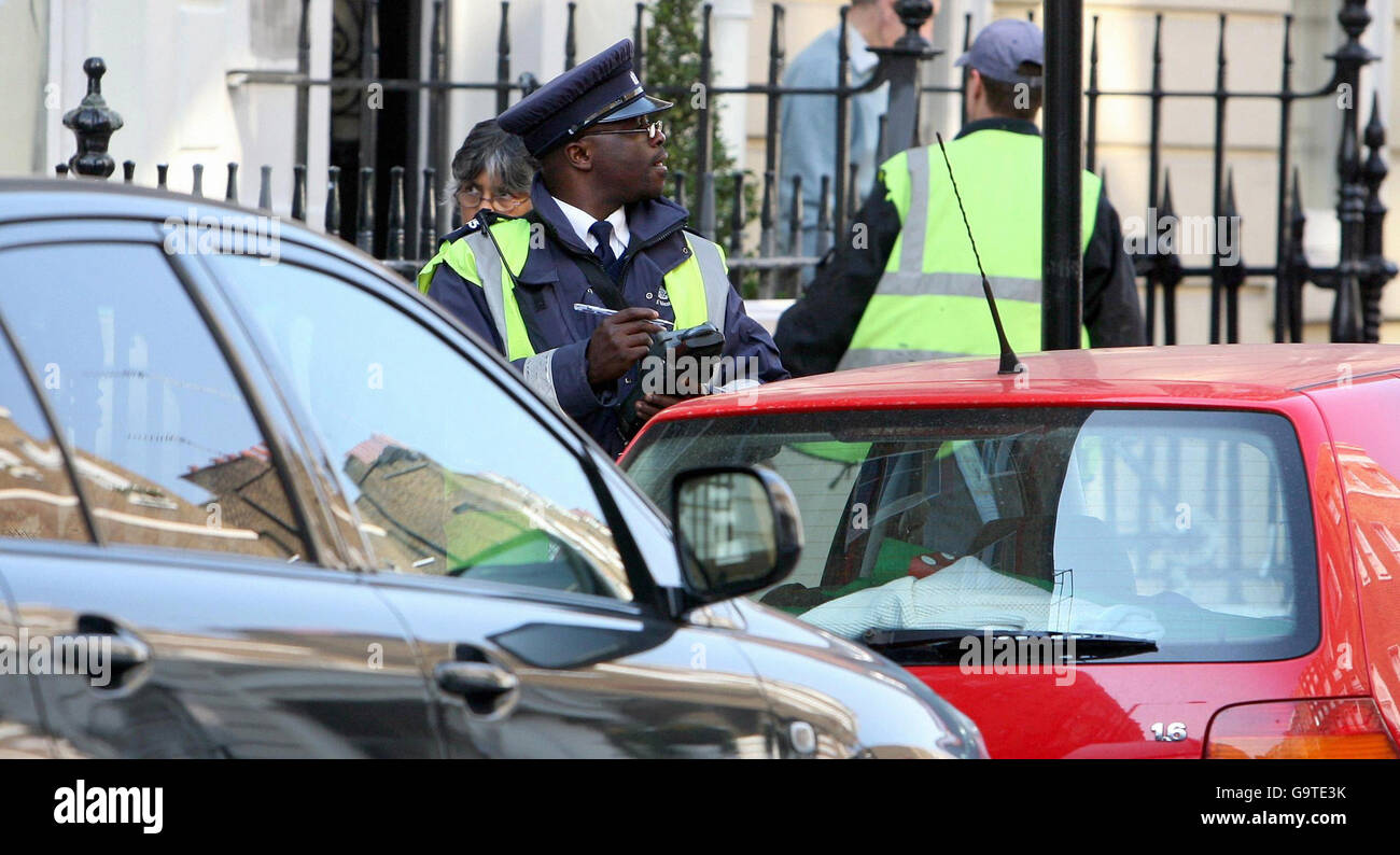 Stock image of a traffic warden at work in central London Stock Photo ...