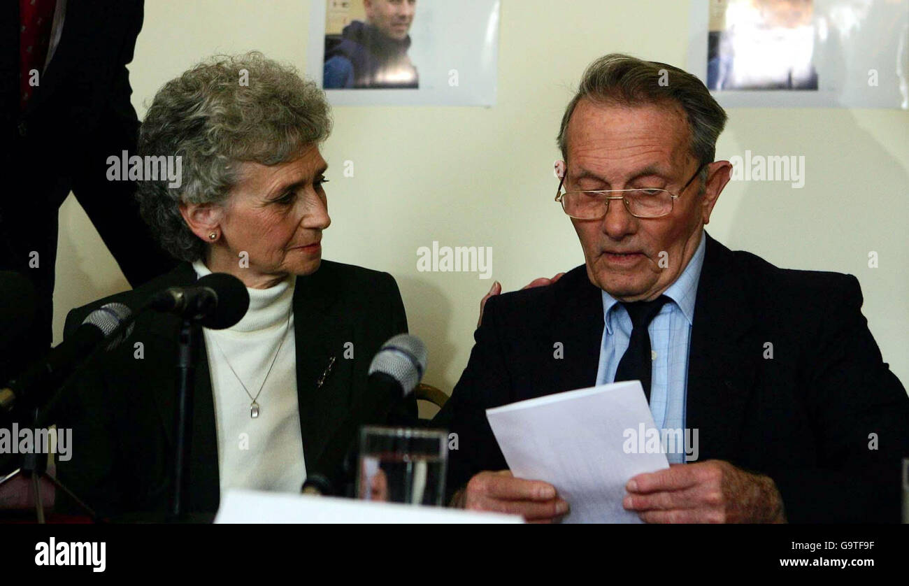 Graham Johnston, father of kidnapped journalist Alan is comforted by ...