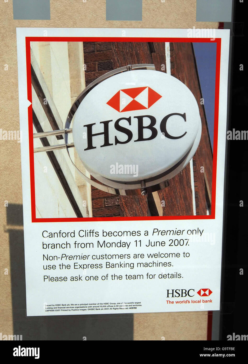 A sign displayed in the window of the HSBC bank at Canford Cliffs ...