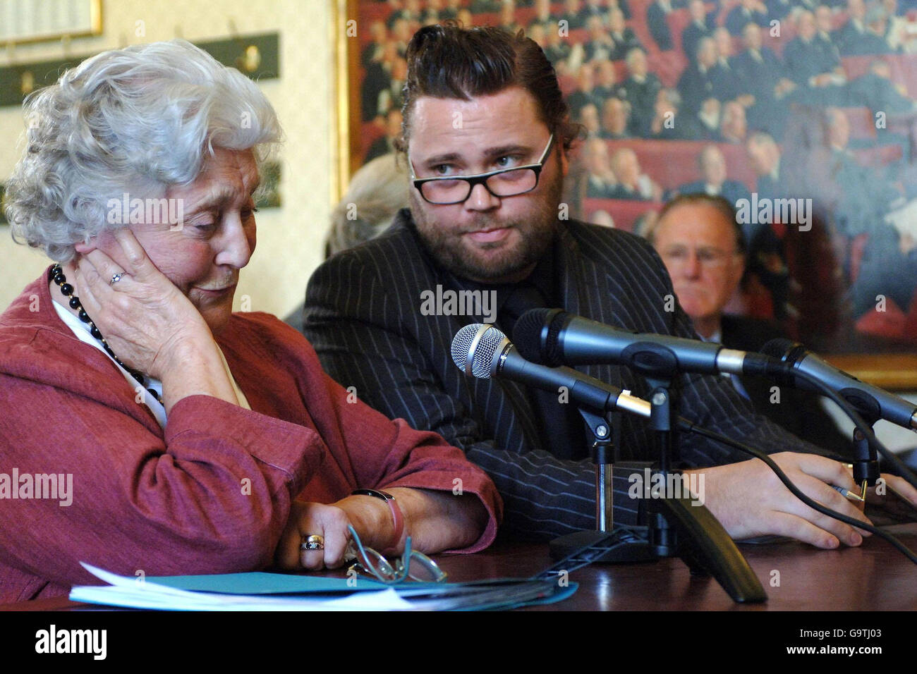 Harriet Bullock, widow of Ken Bullock, is flanked by son Gideon as she ...