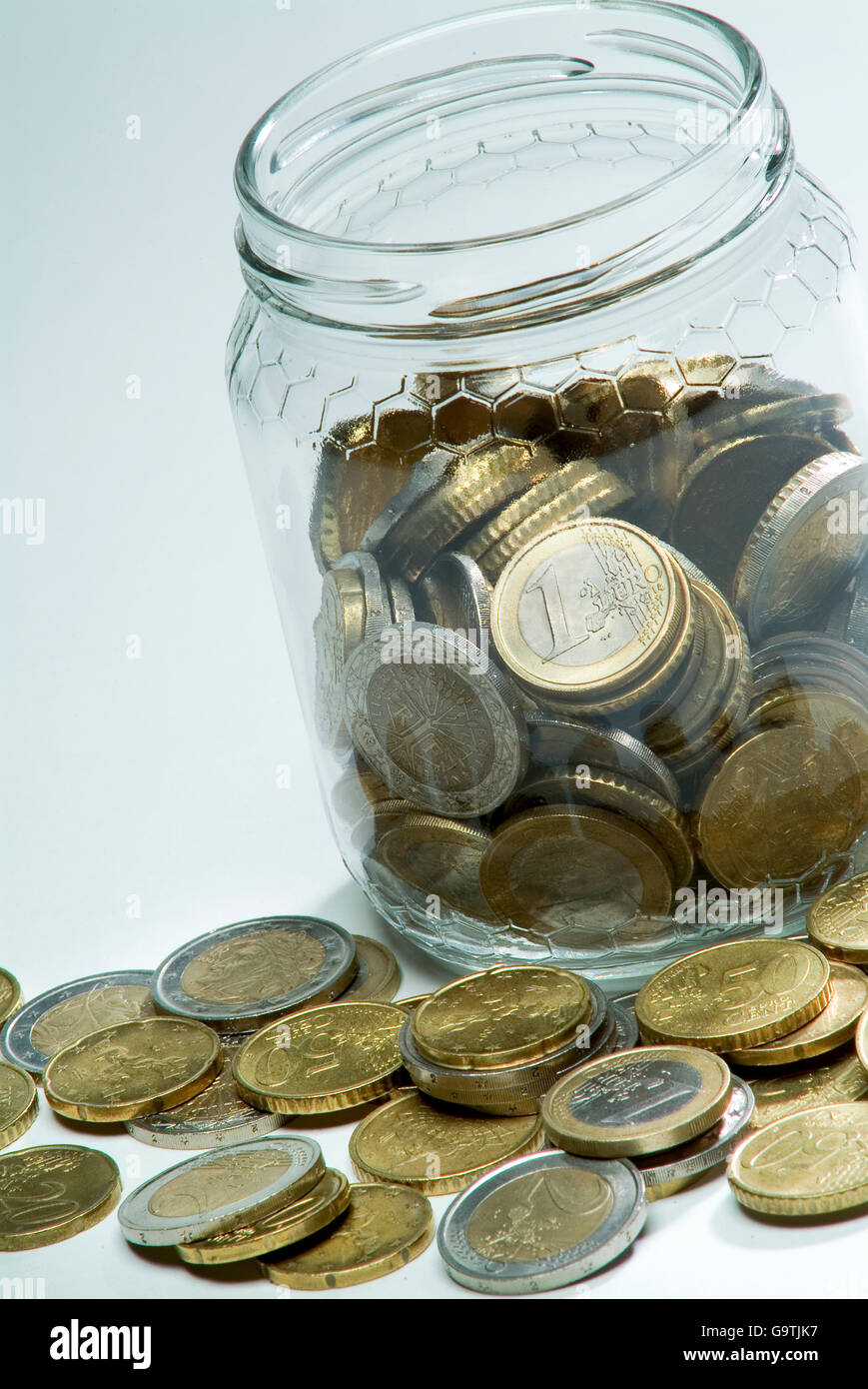 Glass jar with euro coins Stock Photo - Alamy