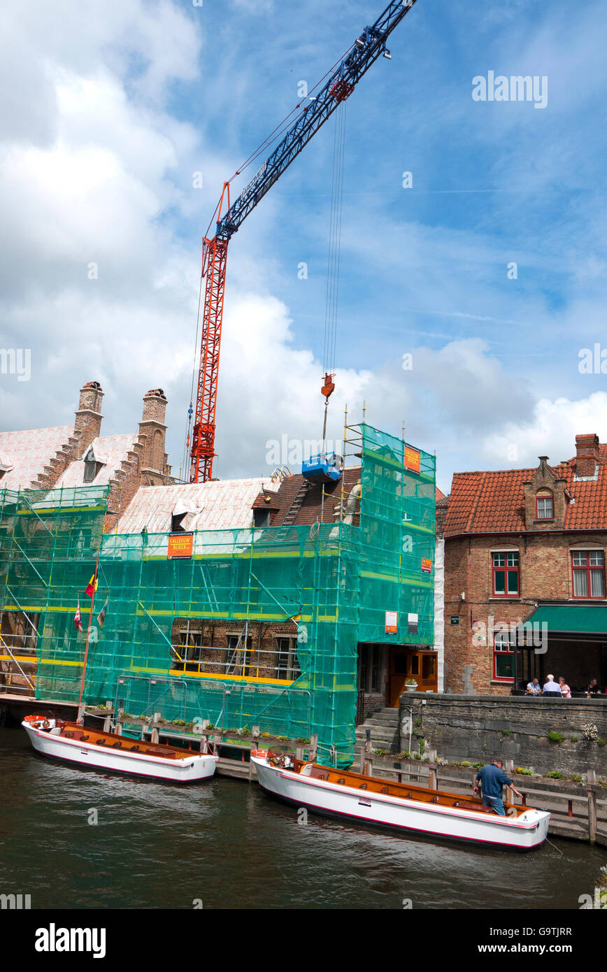 Roofing work being undertaken in Bruges, Belgium Stock Photo - Alamy