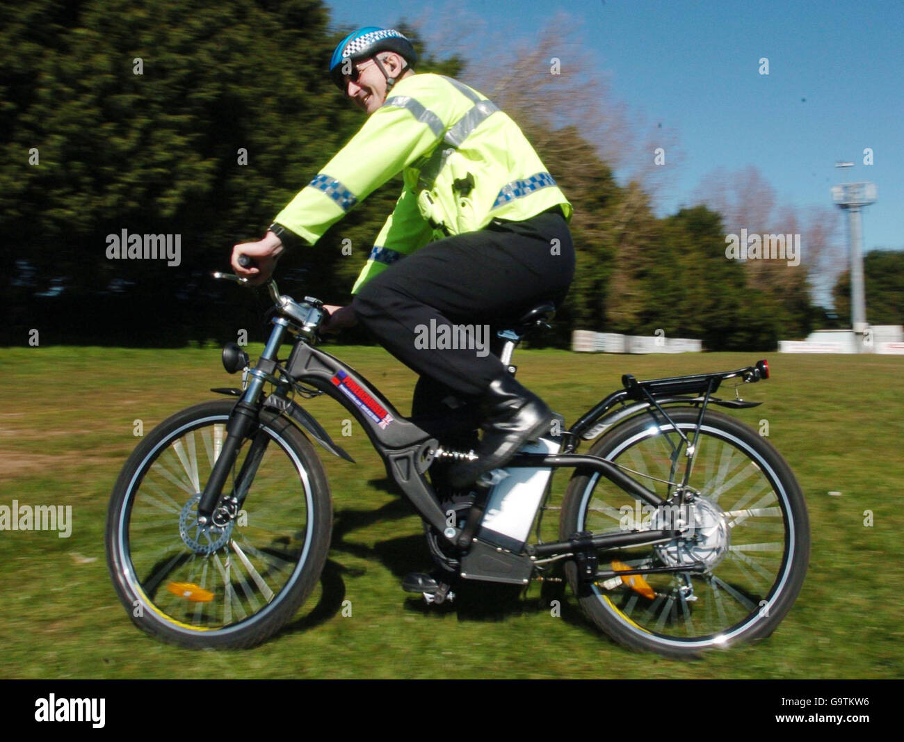 Police force with electric power bike Stock Photo - Alamy