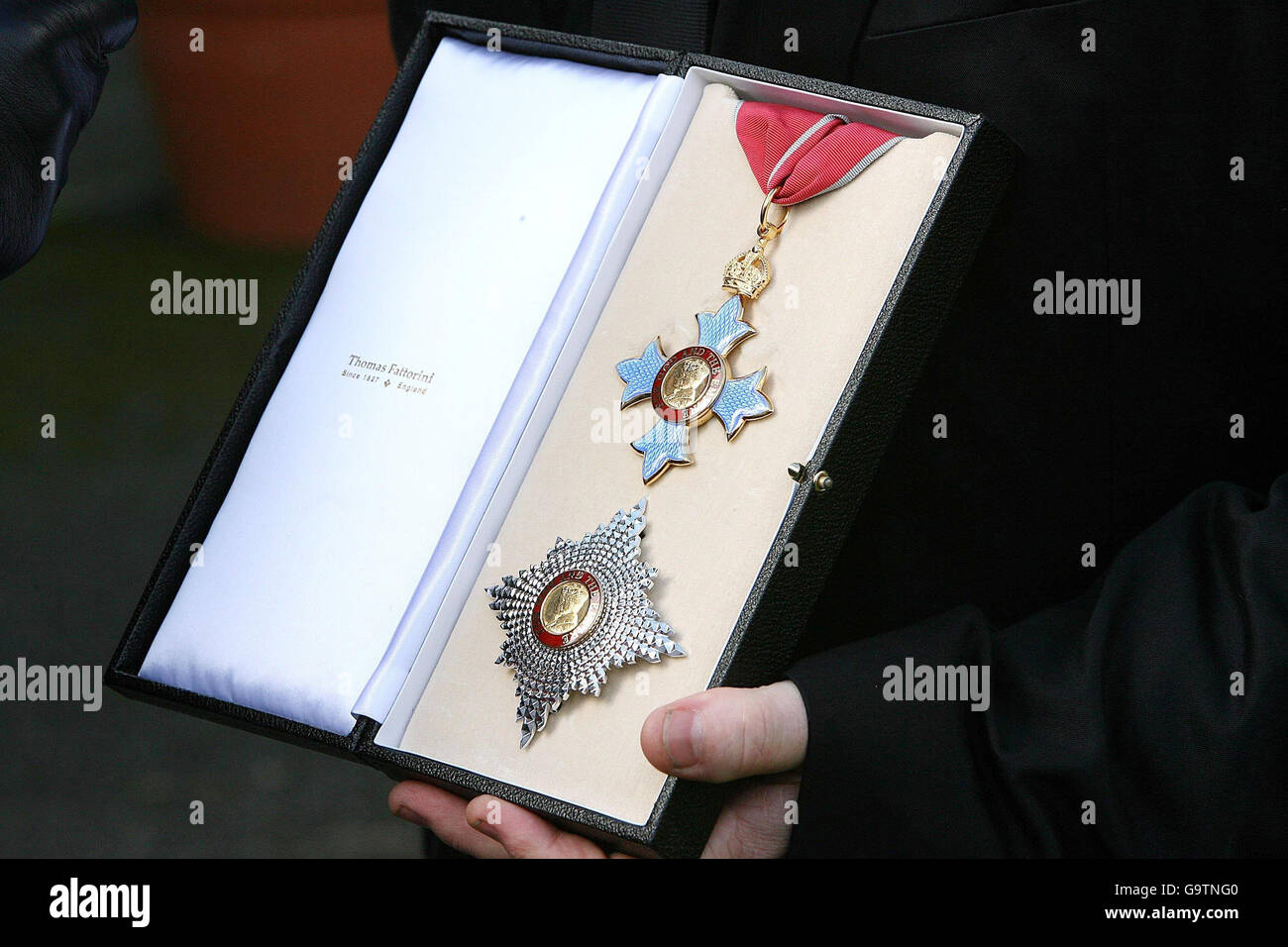 Bono shows off his honorary knighthood outside the British ambassador's ...