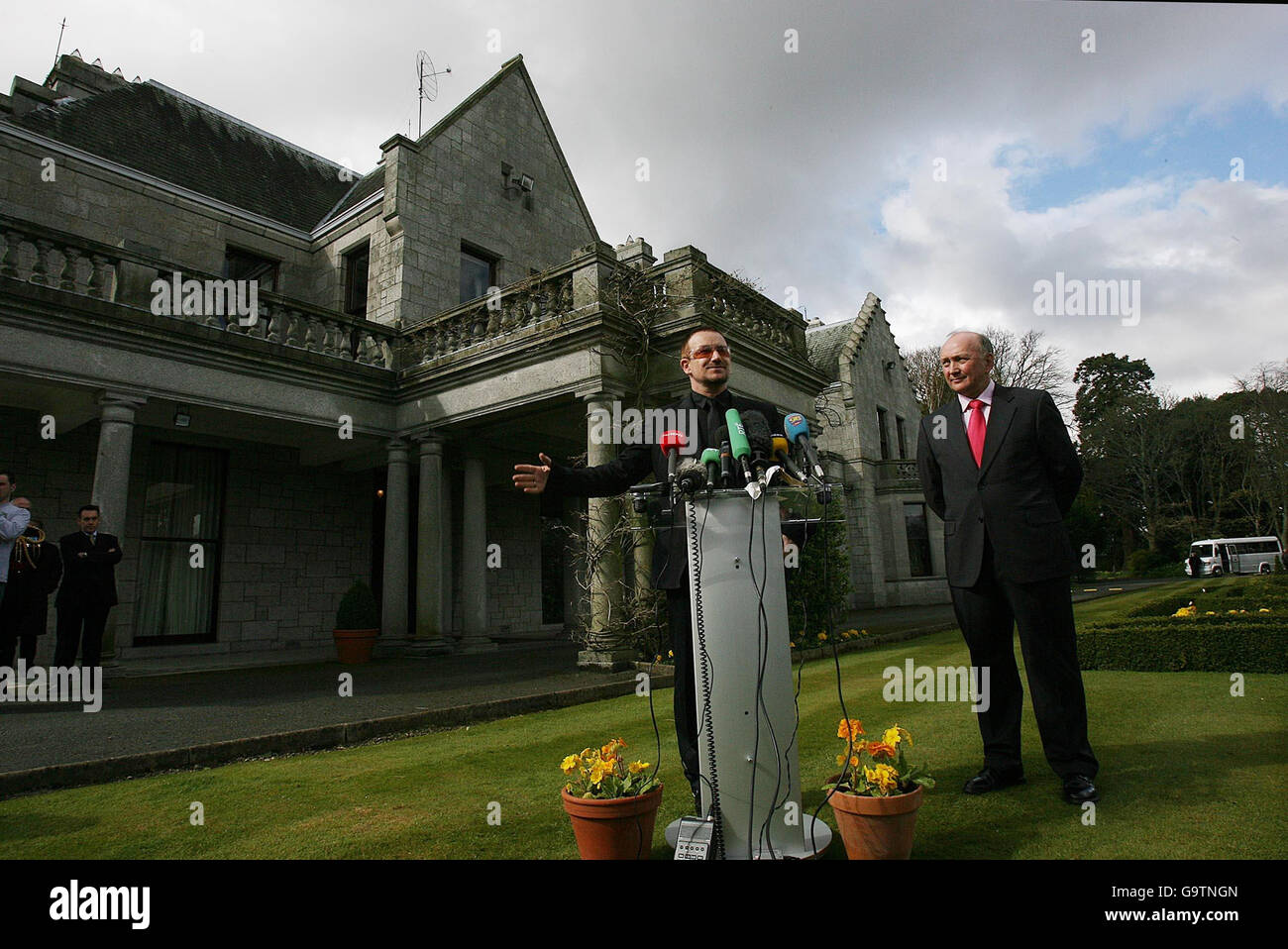 Bono receives honorary knighthood Stock Photo - Alamy