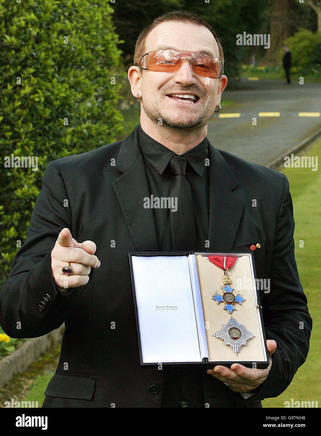 Bono receives honorary knighthood Stock Photo - Alamy