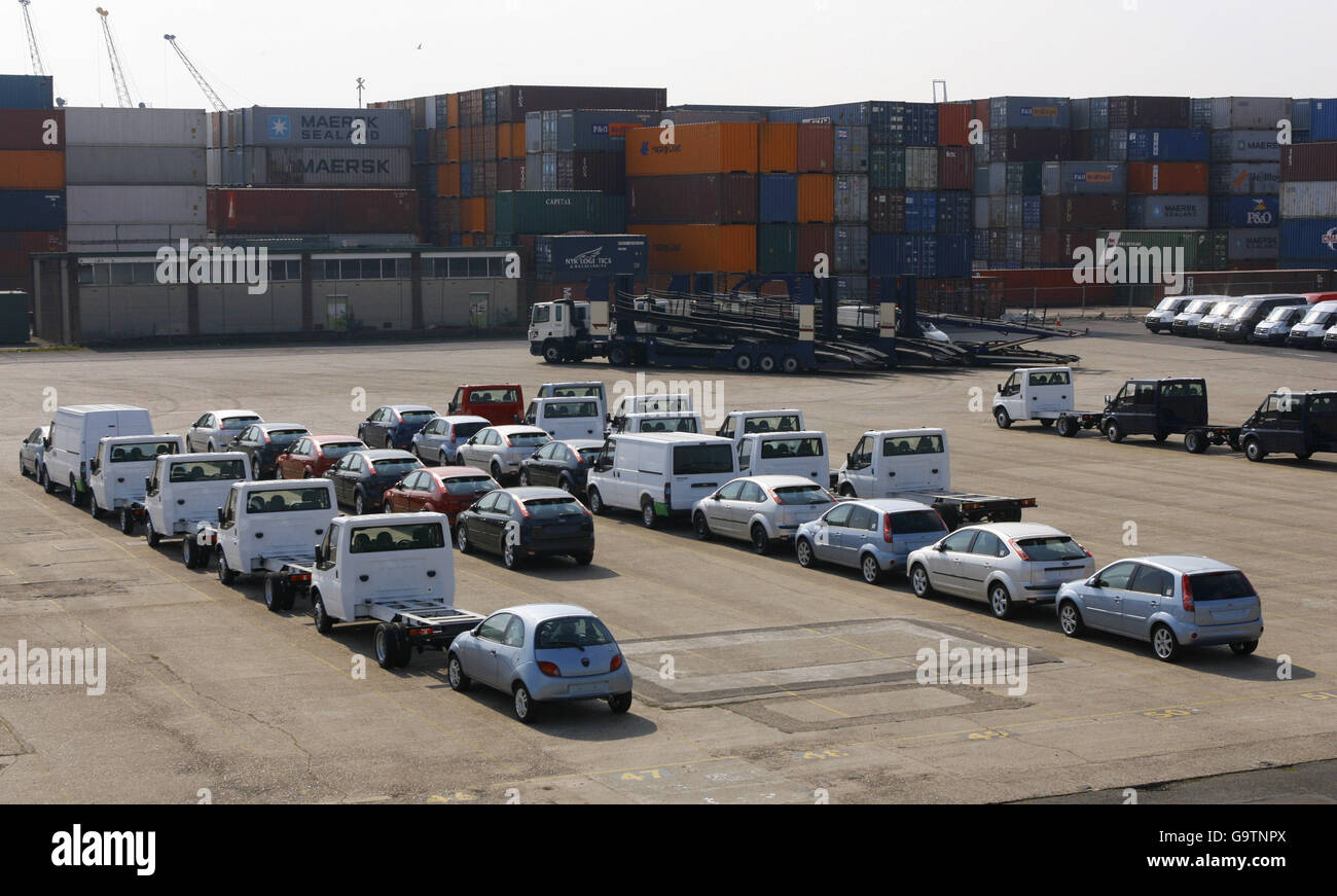 Carbon economy stock. Cars waiting for export alongside containers at ...