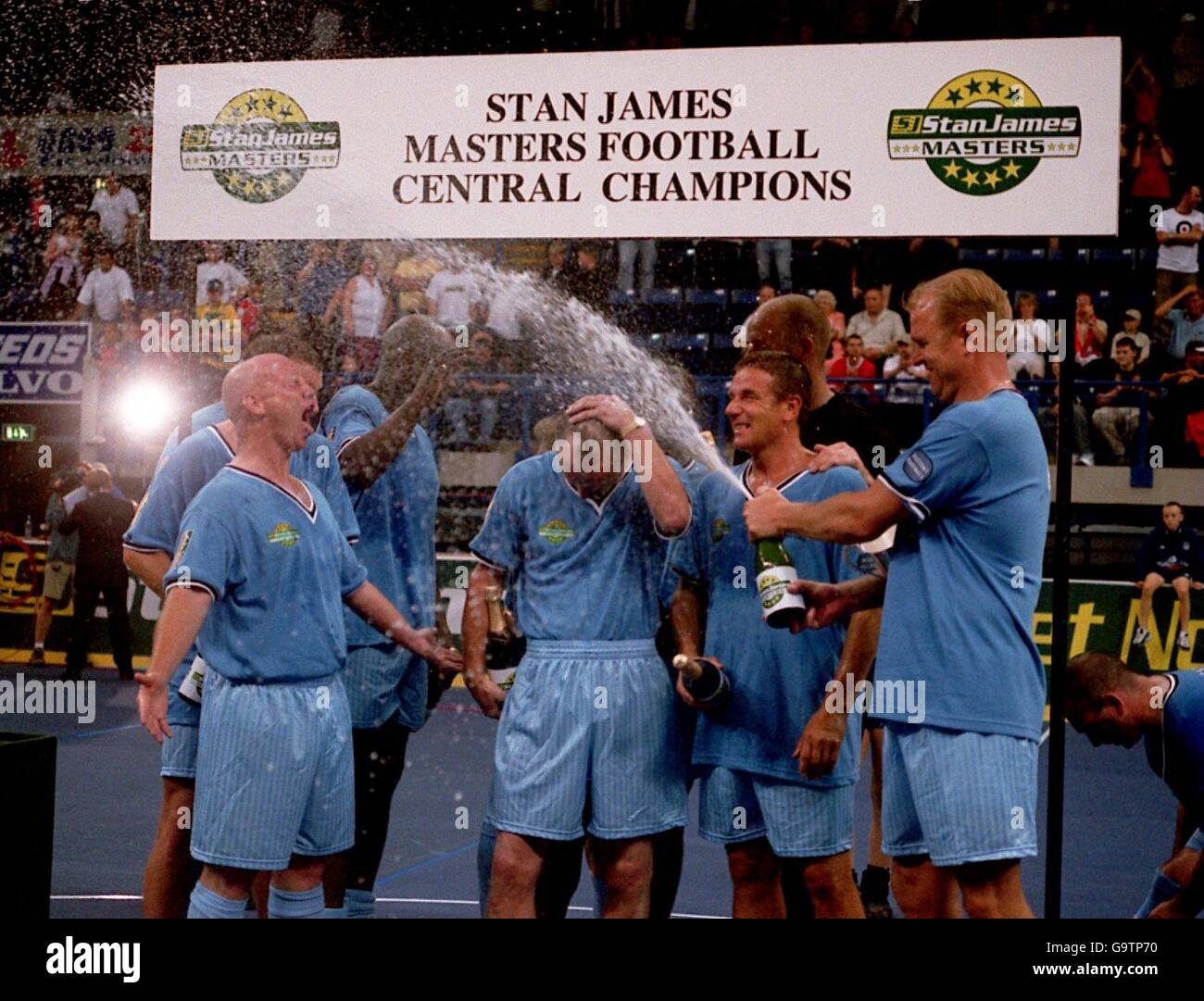 Coventry City's David Speedie is sprayed in champagne by his team mates ...