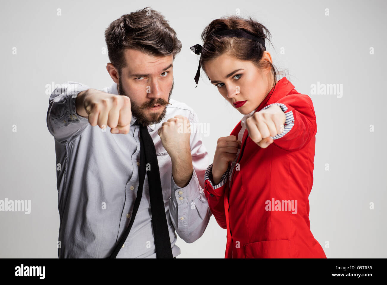 The militant business man and woman Stock Photo - Alamy