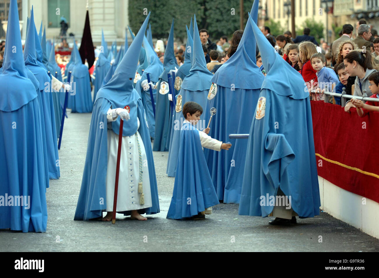 Members of the brotherhood of San Esteban in Seville, Southern Spain ...