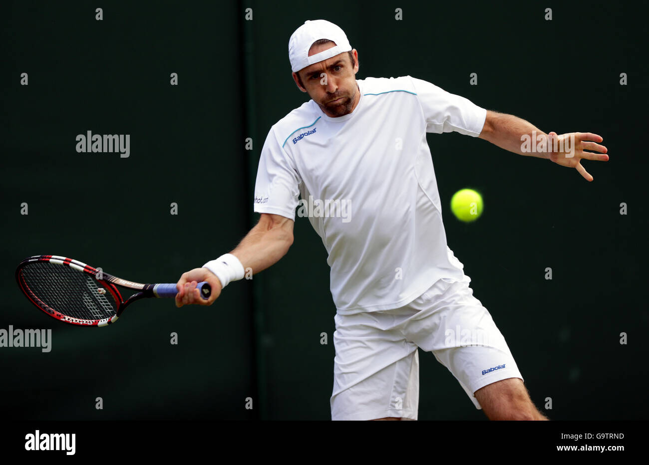 Benjamin Becker in action Tomas Berdych on day Five of the Wimbledon ...
