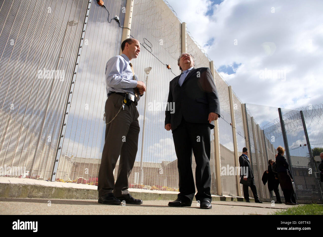 Lord Falconer speaks with prison governor Peter Dawson at HighDown ...