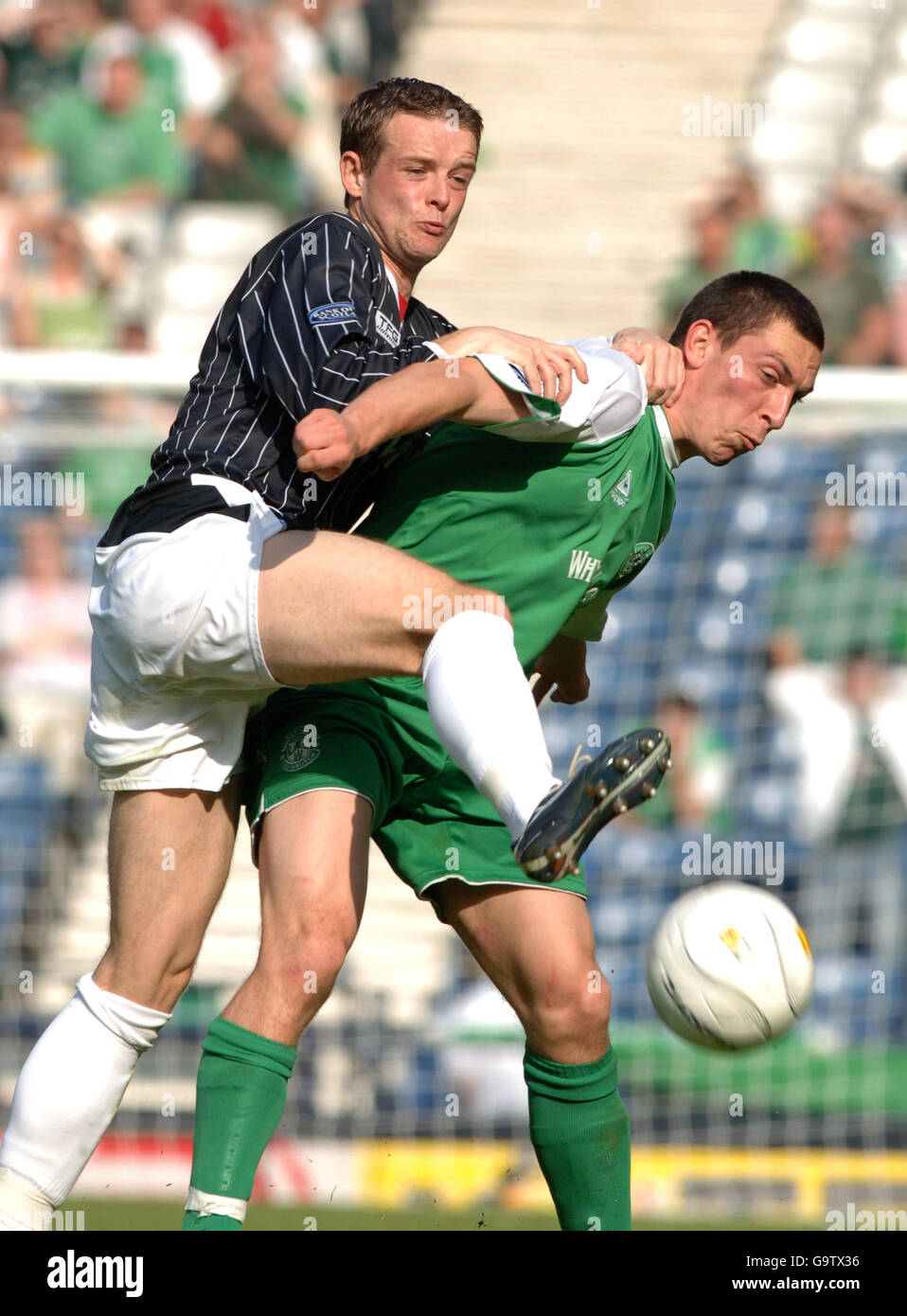 Hibernian's Scott Brown tangles with Dunfermline Athletic's Jamie ...