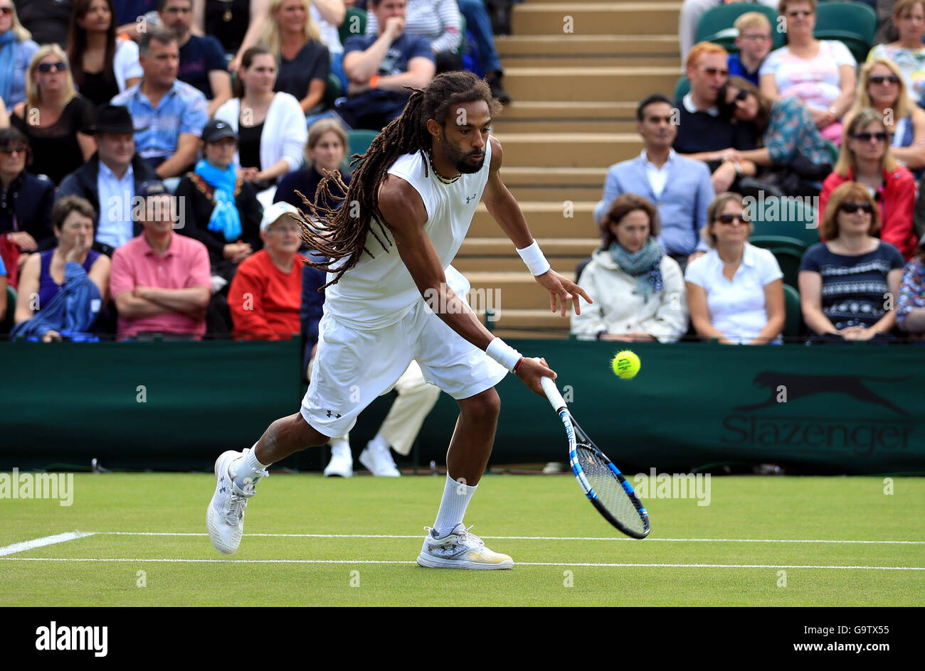 Dustin Brown in action against Nick Kyrgios on day Five of the ...
