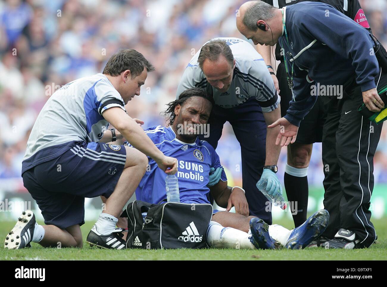 Chelsea's Didier Drogba recieves treatment for an injury Stock Photo ...