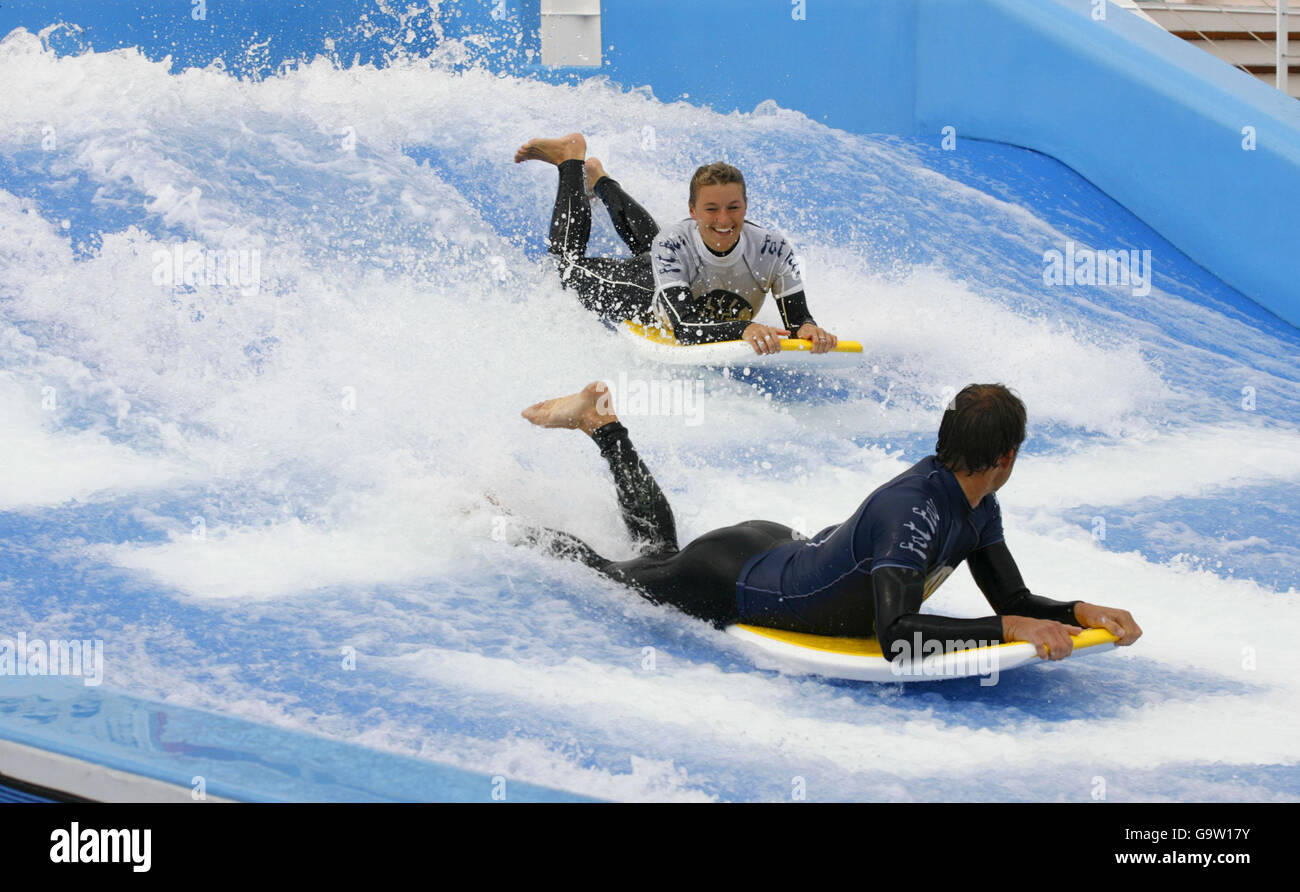 Staff try out the Flowrider surf simulator aboard the Liberty of the ...