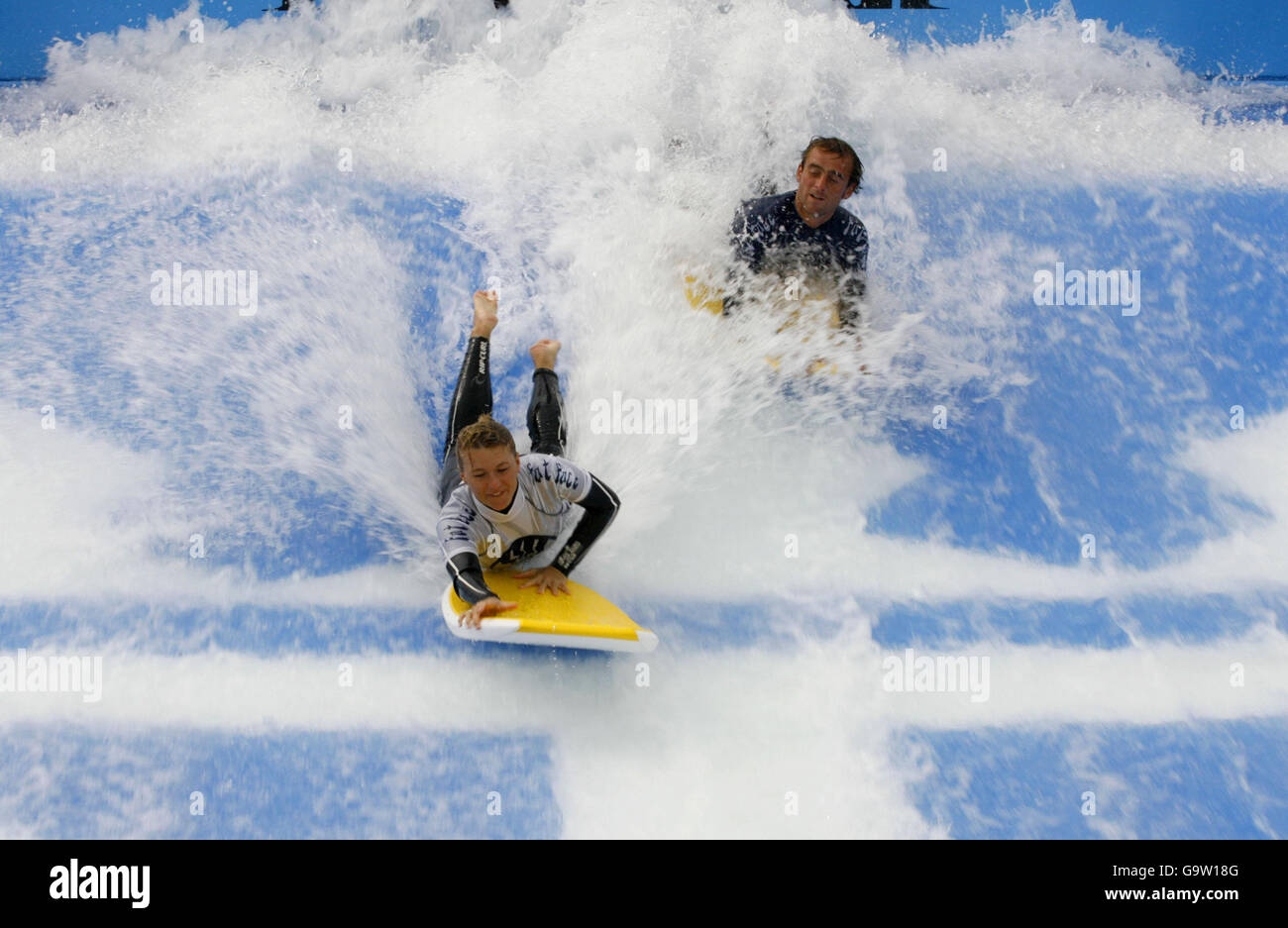 Staff try out the Flowrider surf simulator aboard the Liberty of the ...