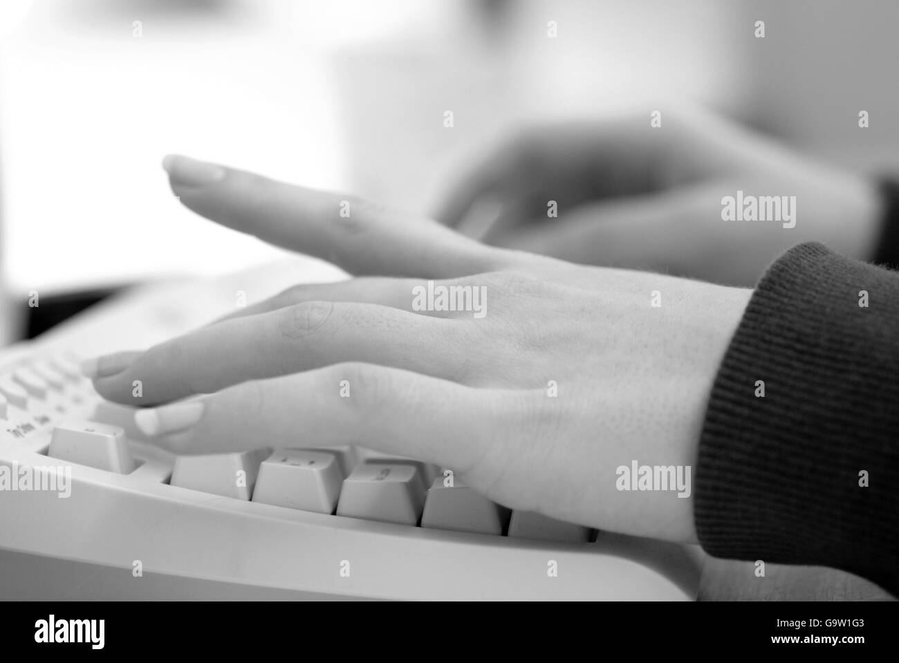 Typing on Computer Keyboard b&w Stock Photo - Alamy