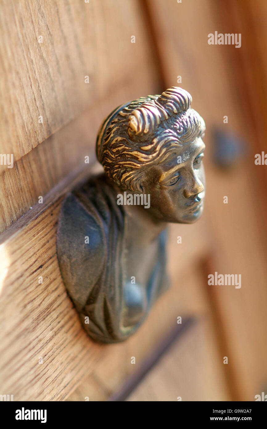 female face door knob Stock Photo - Alamy