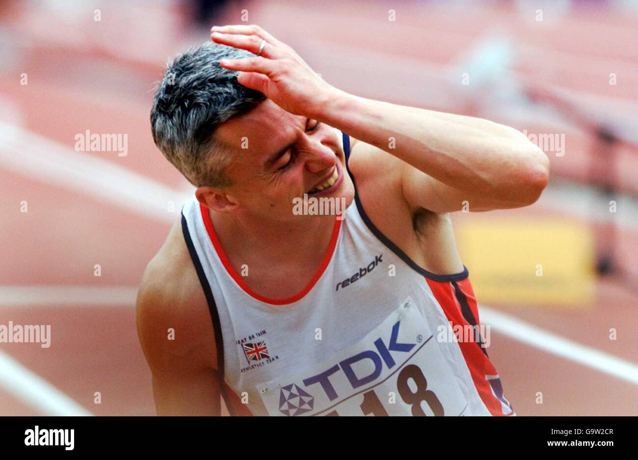 The pressure shows on the face of Great Britain's Jonathan Edwards as ...