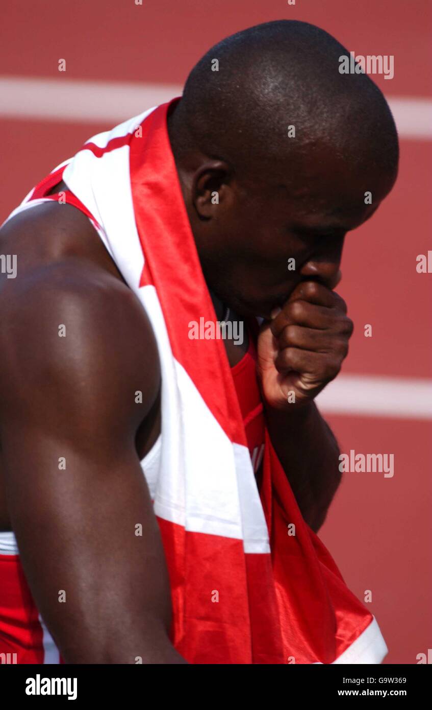 Canada's Donovan Bailey gets emotional as he leaves the track wrapped ...