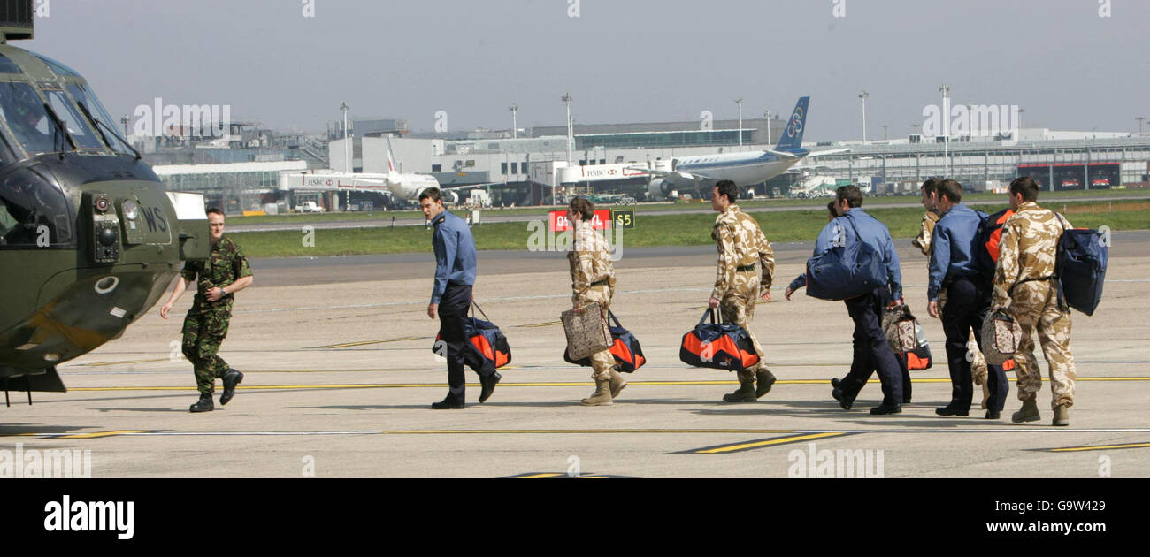 British service personnel after disembarking a plane at Heathrow ...
