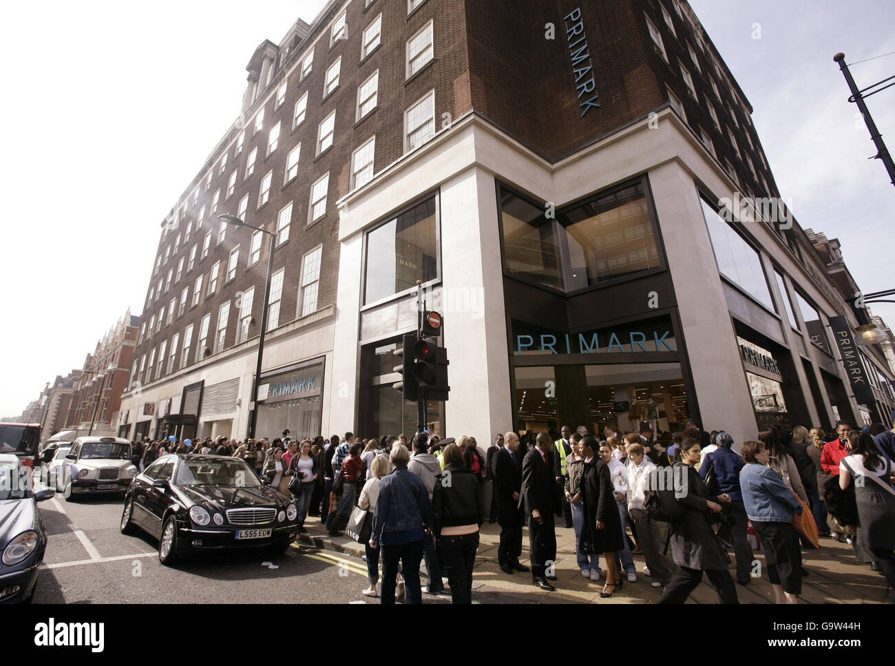 Shoppers queue outside the new Primark flagship store on London's ...