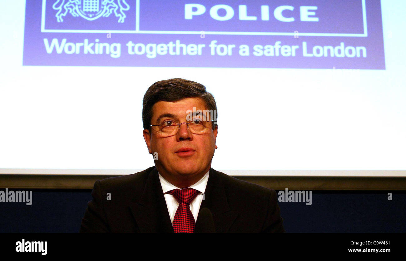 Head shot headshot portrait serious speaking metropolitan police logo ...