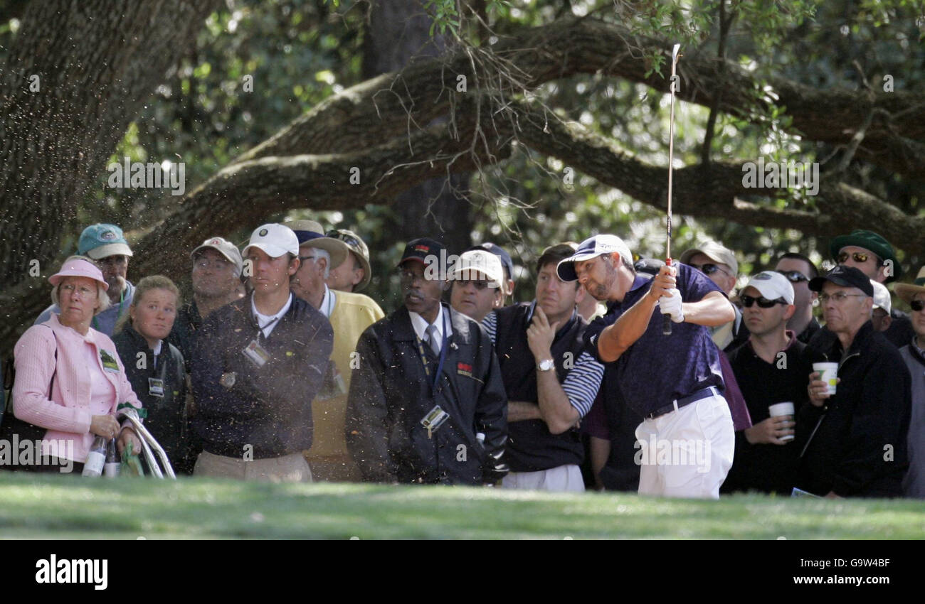 Sergio Garcia, from Spain, hits from the rough on the first hole in the ...