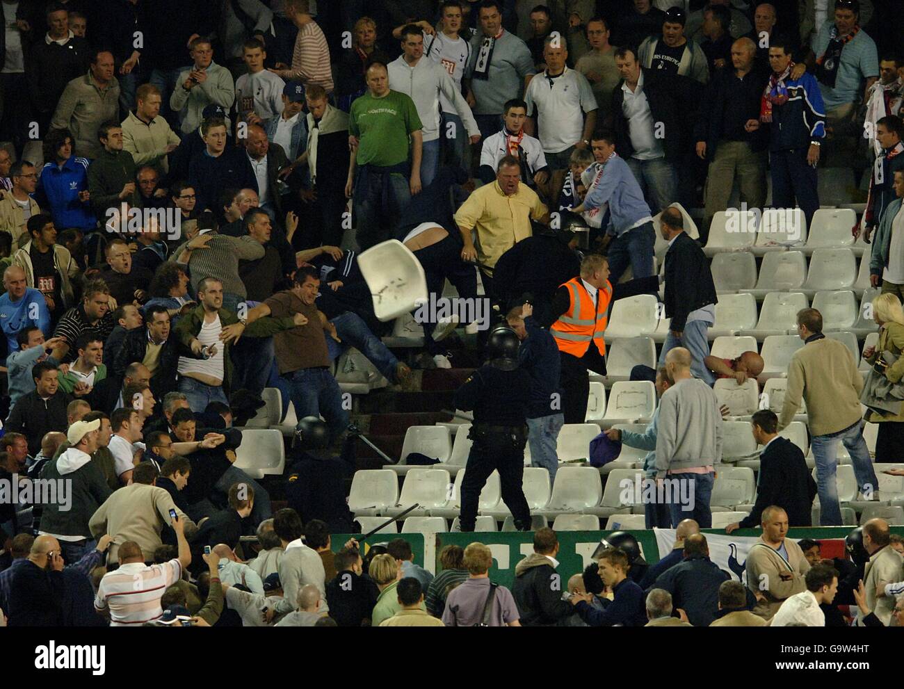 Tottenham hotspur fans and police clash in the stands hi-res stock ...