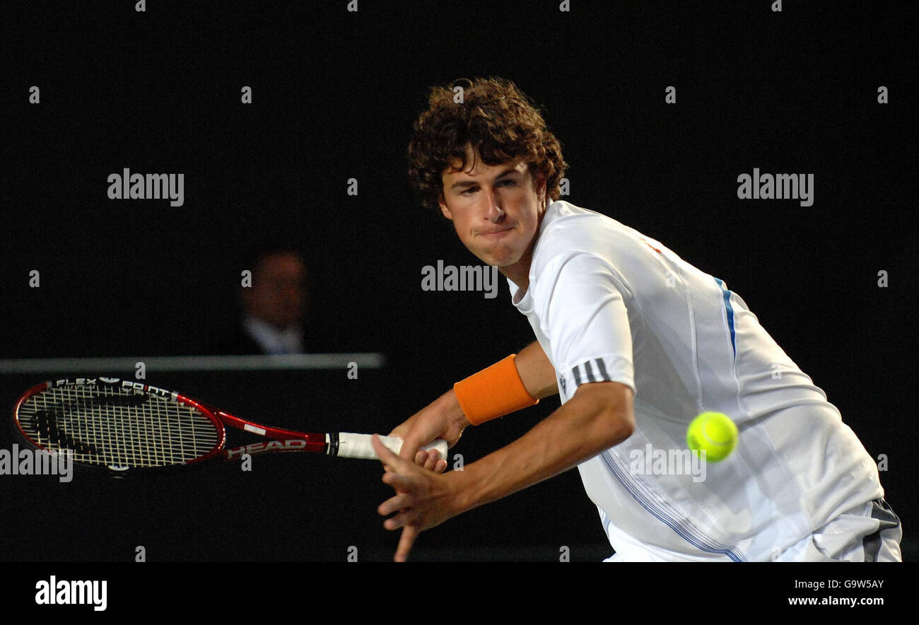 Netherlands' Robin Haase in action against Great Britain's Tim Henman ...