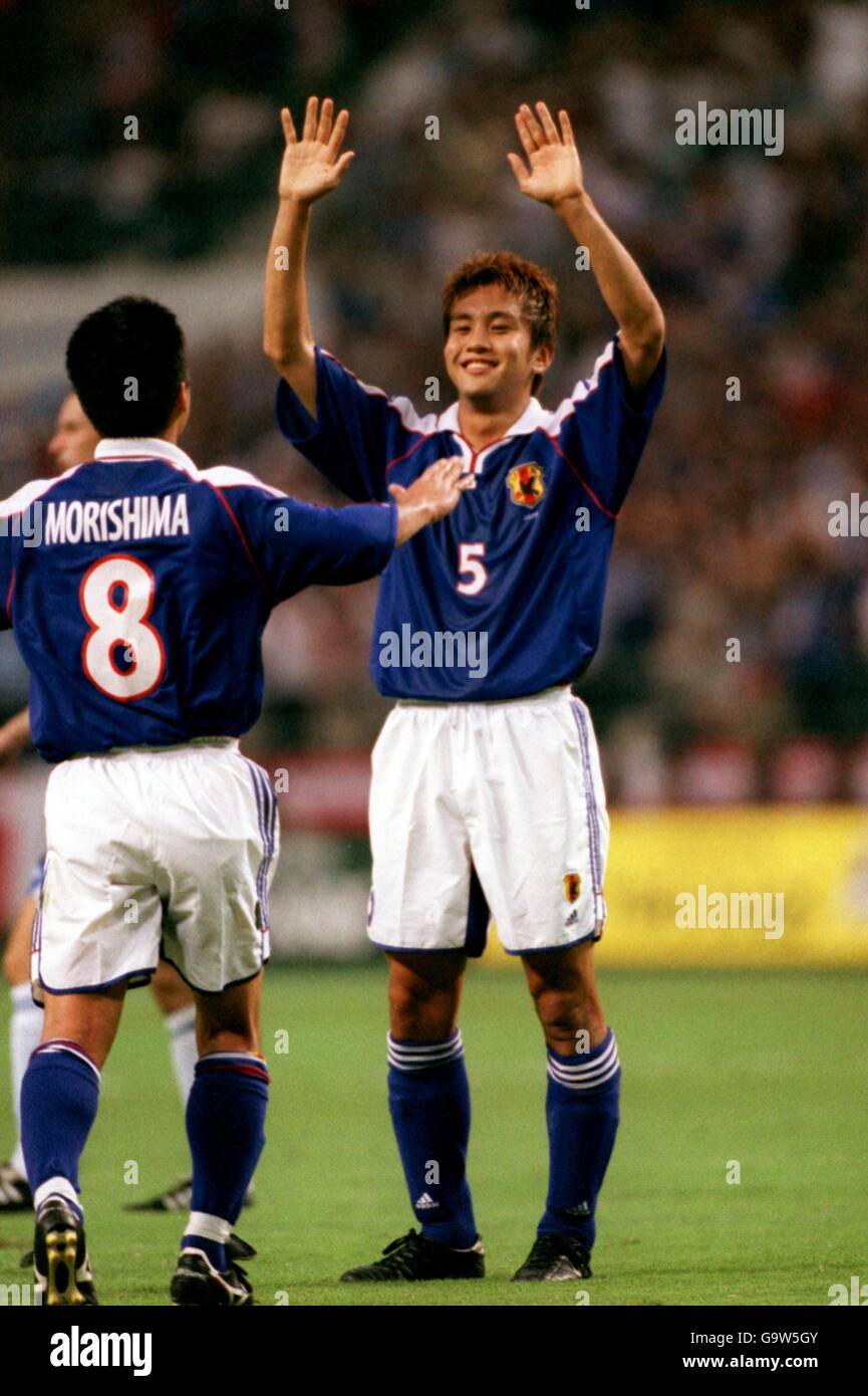 Japans junichi inamoto celebrates his goal with hiroaki morishima hi ...
