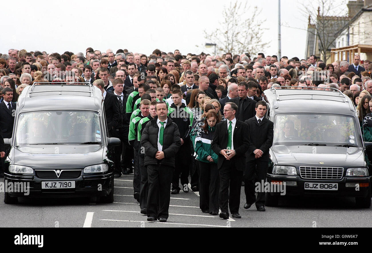 The funeral procession is seen after the joint funeral of cousins and ...