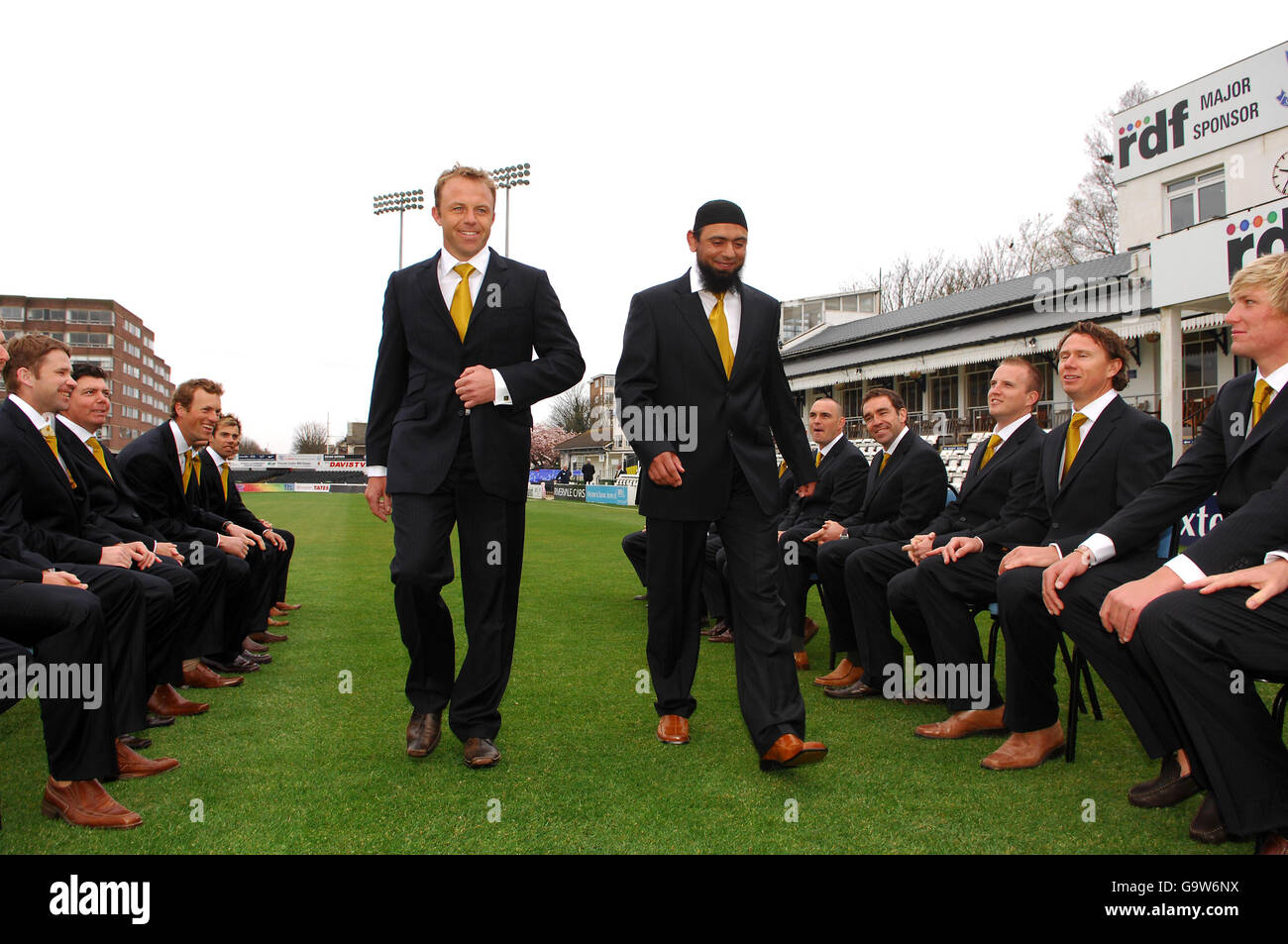 Sussex's Chris Adams (left) and Saqlain Mushtaq display their new suits ...