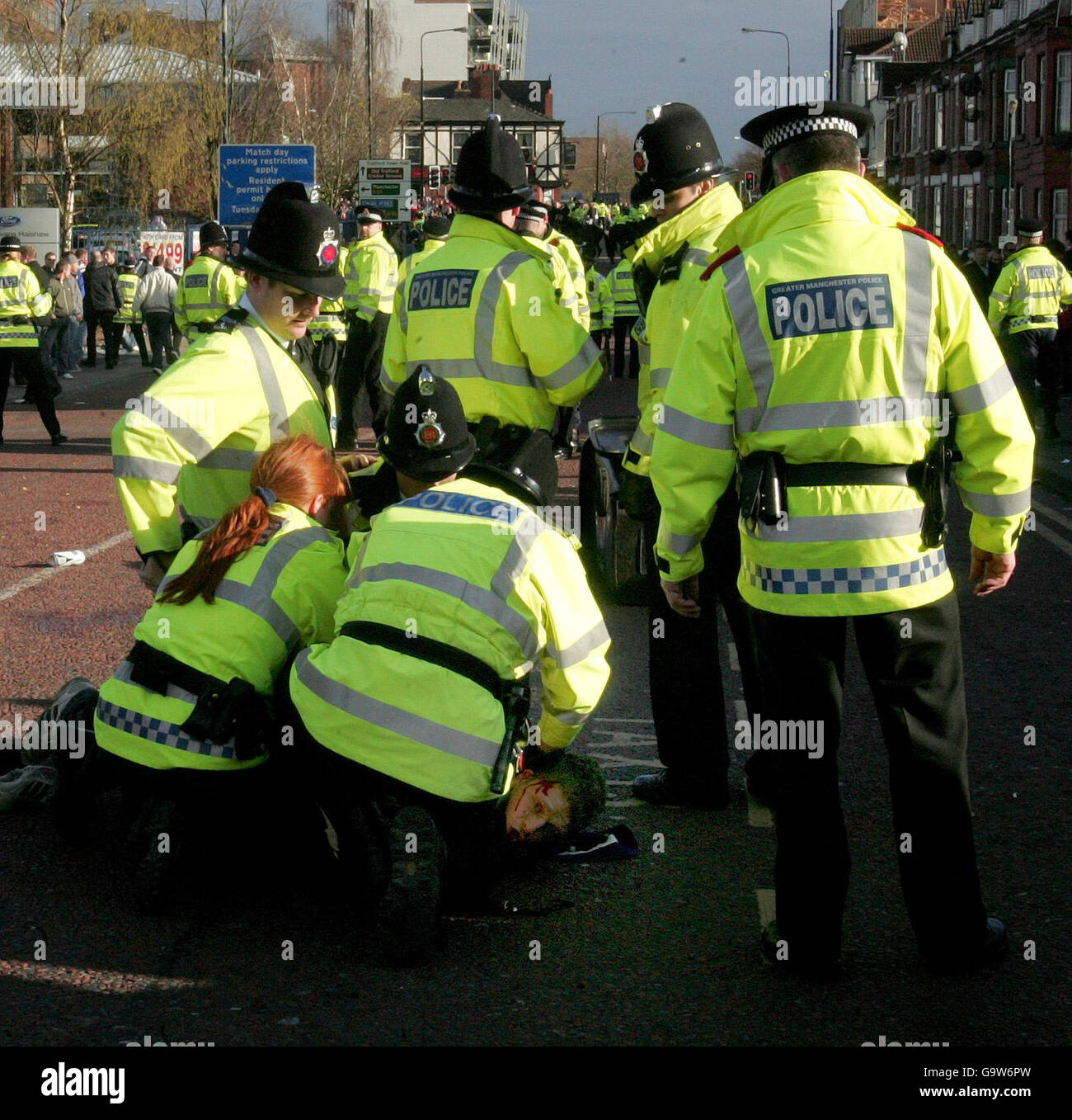 A fan is led away hi-res stock photography and images - Alamy