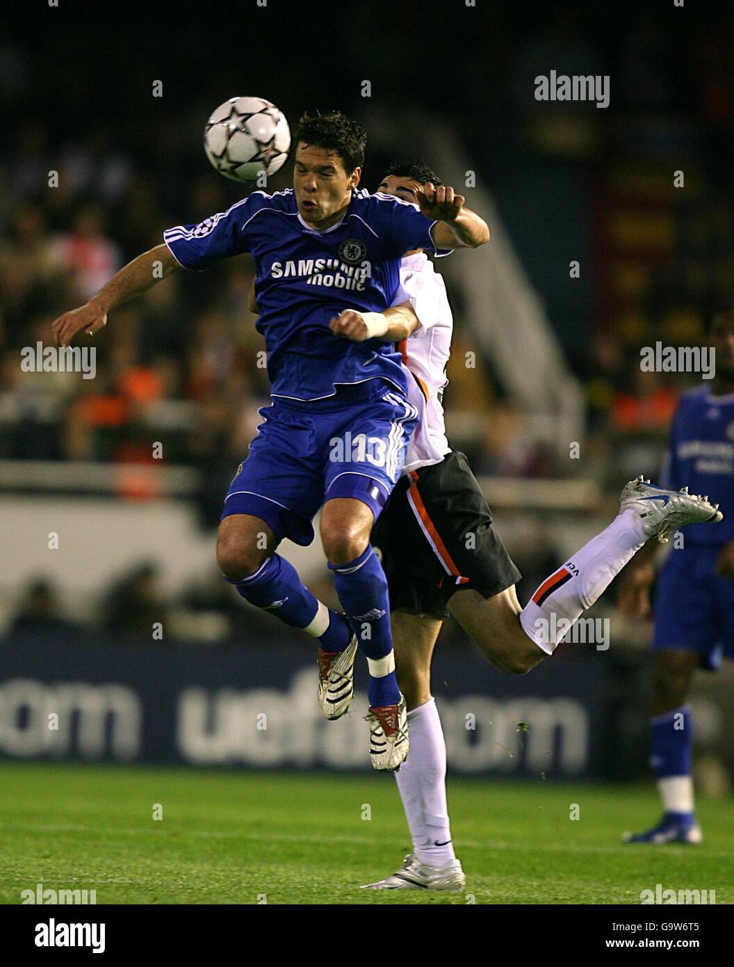 Valencia's Raul Albiol and Chelsea's Michael Ballack battle for the ...