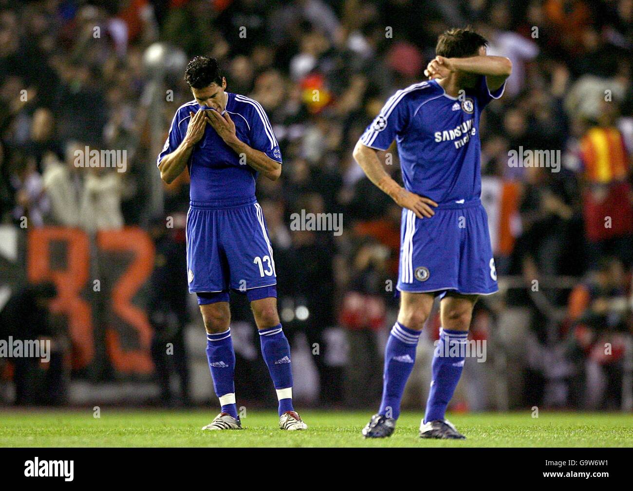 Chelsea's Frank Lampard and Michael Ballack (left) stand dejected after ...