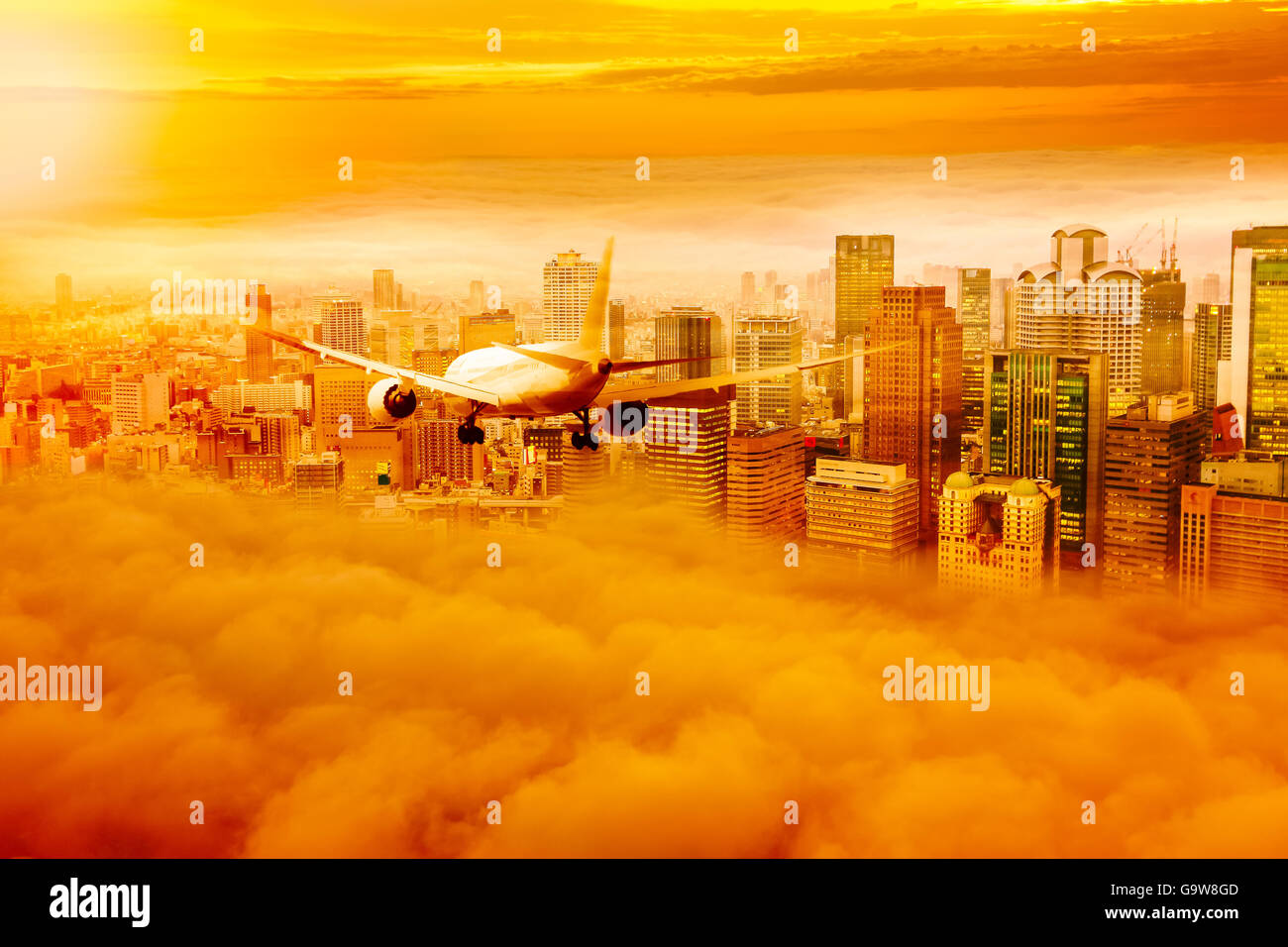 Business concept going home : Commercial airplane flying to modern city ...