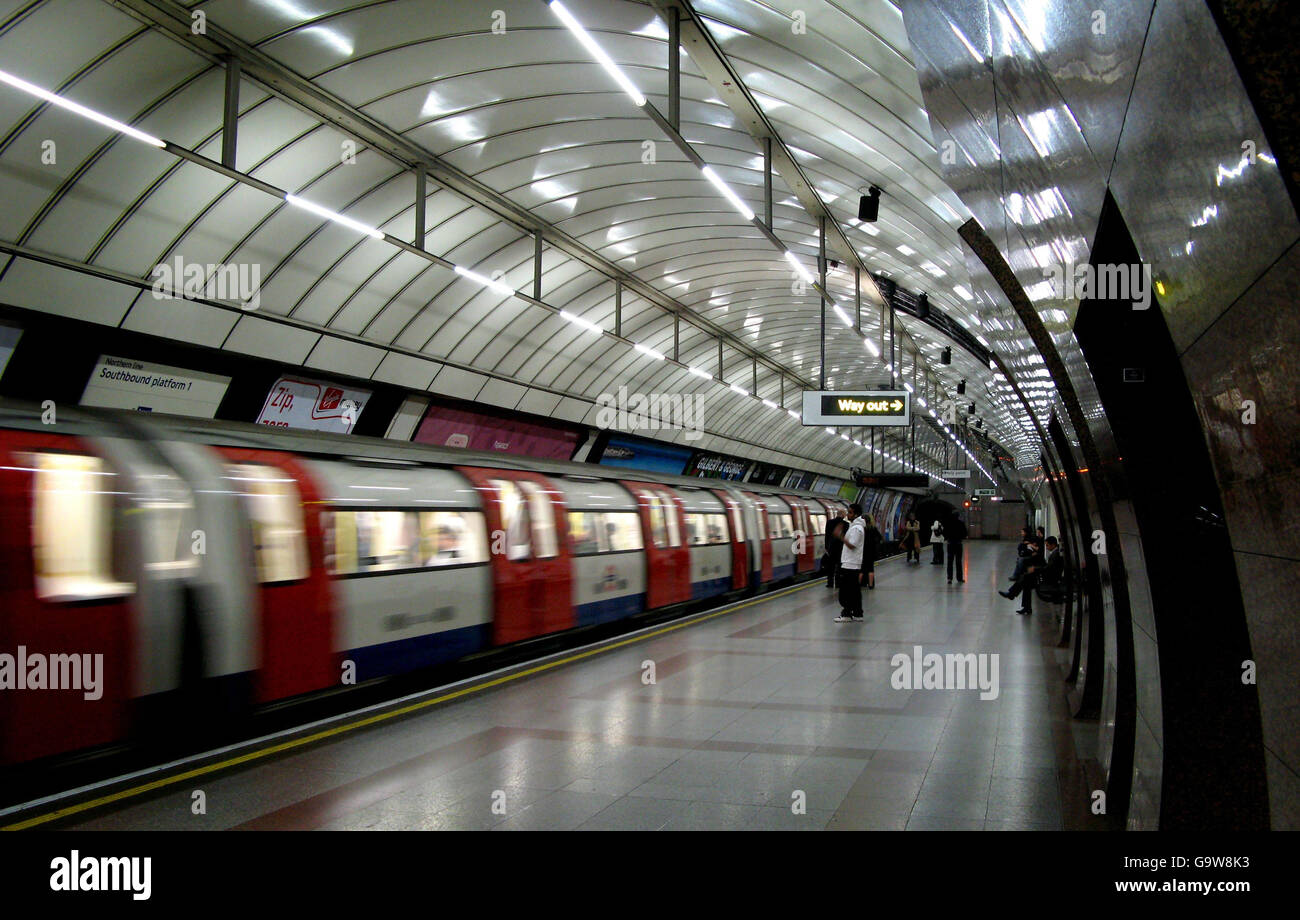 A London Underground train arrives at Angel tube station Stock Photo ...