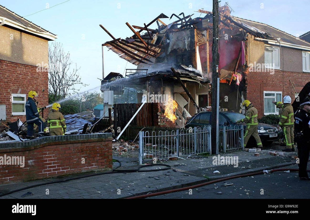 Firefighters at the scene of devastation after a suspected gas blast ...