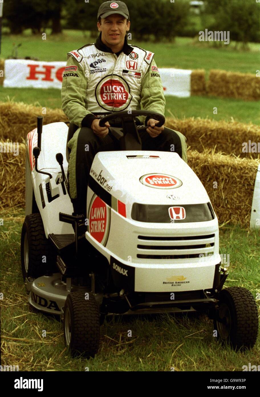 Olivier panis rides a bar lawn mower hi-res stock photography and ...