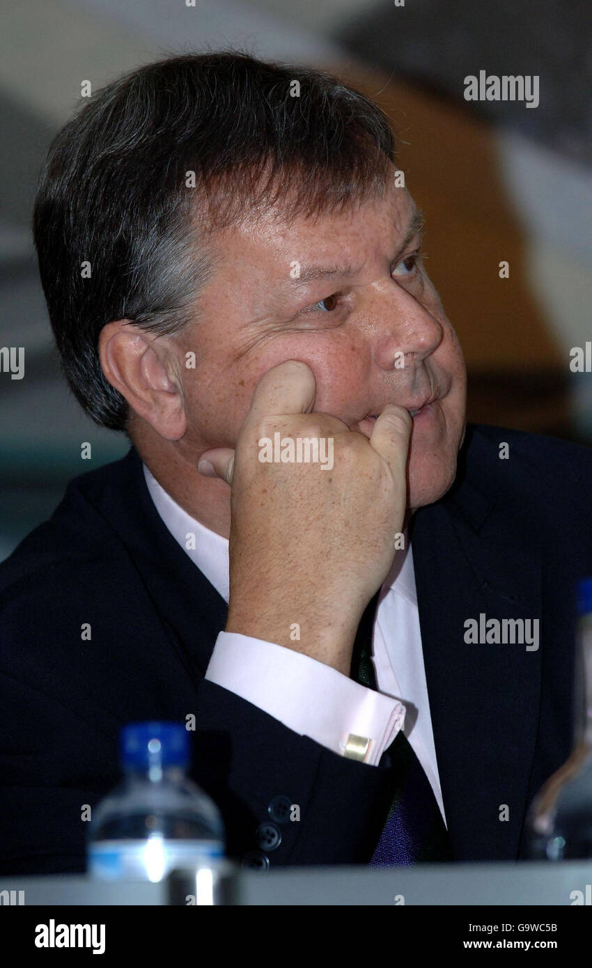 The All England Lawn Tennis Club Chief Executive Ian Ritchie bites his ...