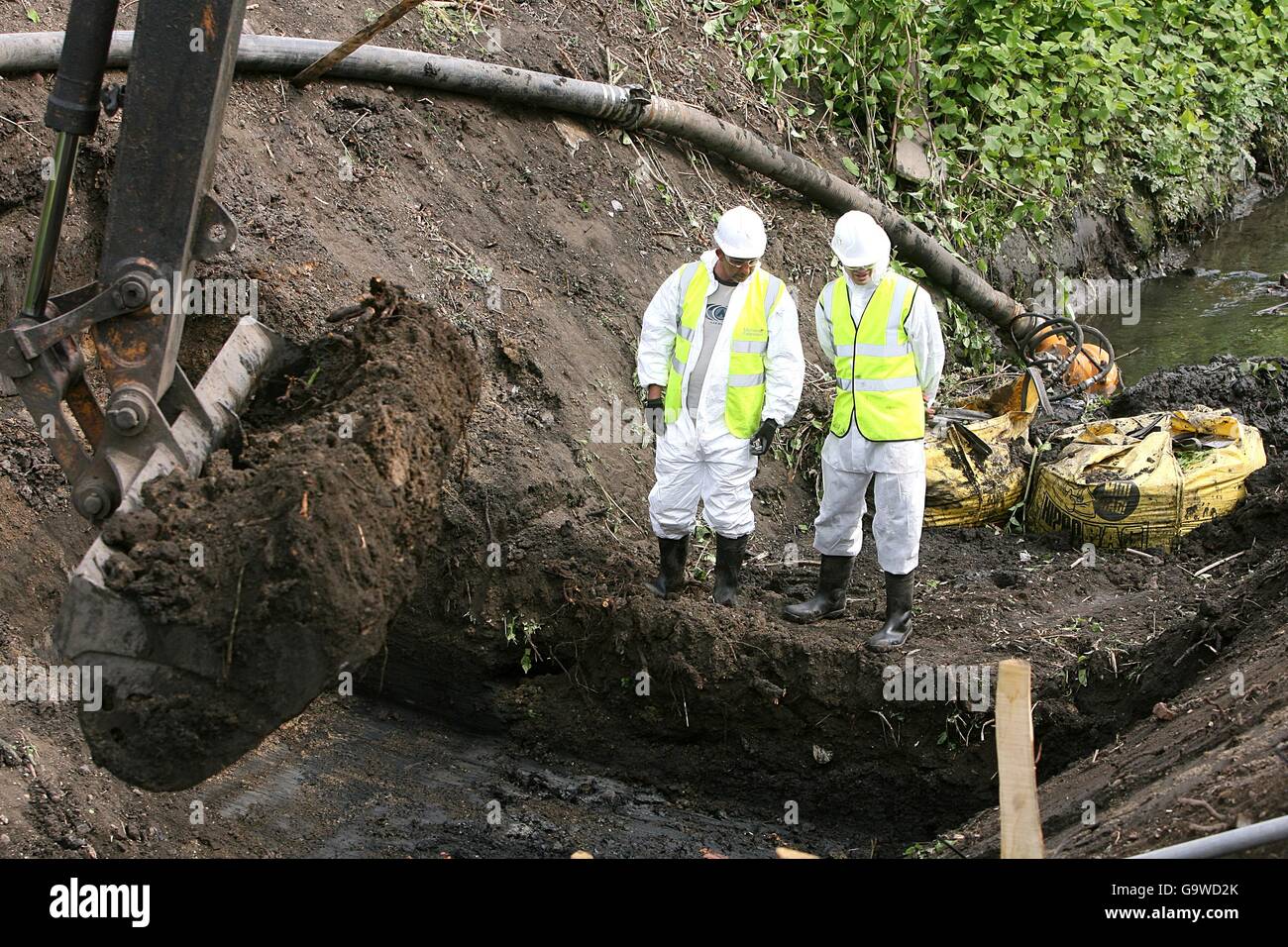 Archaeologists from the Museum of London investigating trenches around ...