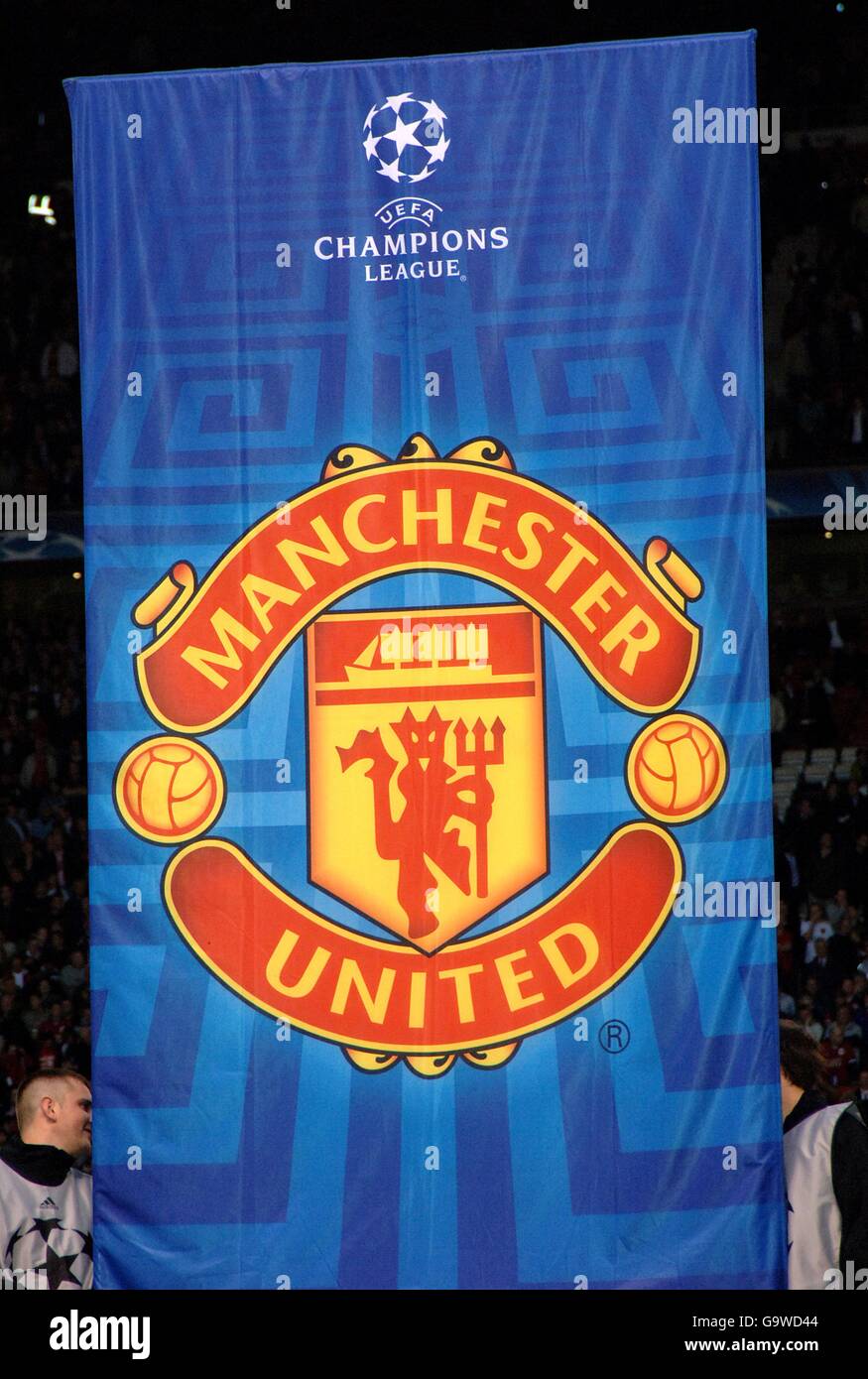 A Manchester United banner is raised prior to kick off Stock Photo - Alamy