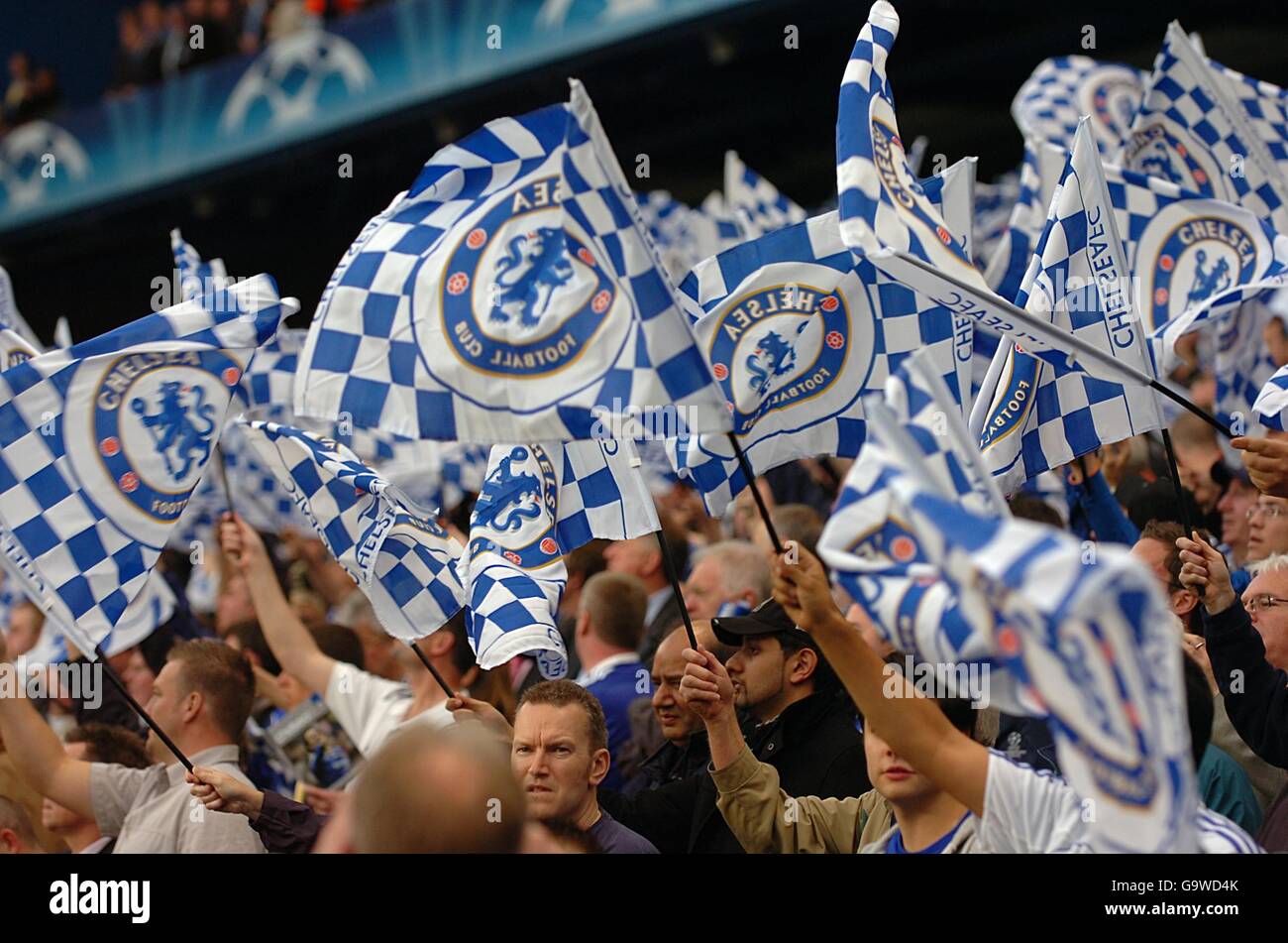 Chelsea fans wave their free flags hi-res stock photography and images ...