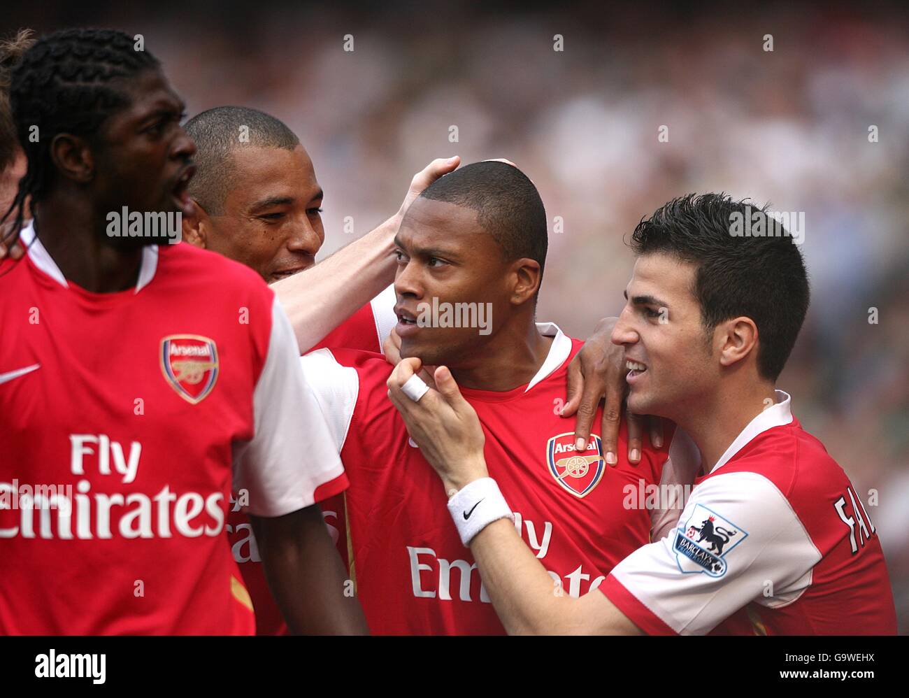 Arsenal's Cesar Julio Baptista (c) celebrates after scoring the opening ...