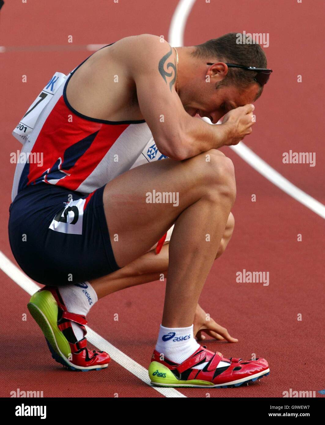Great Britain's Dean Macey rests his groin injury following his 110 ...