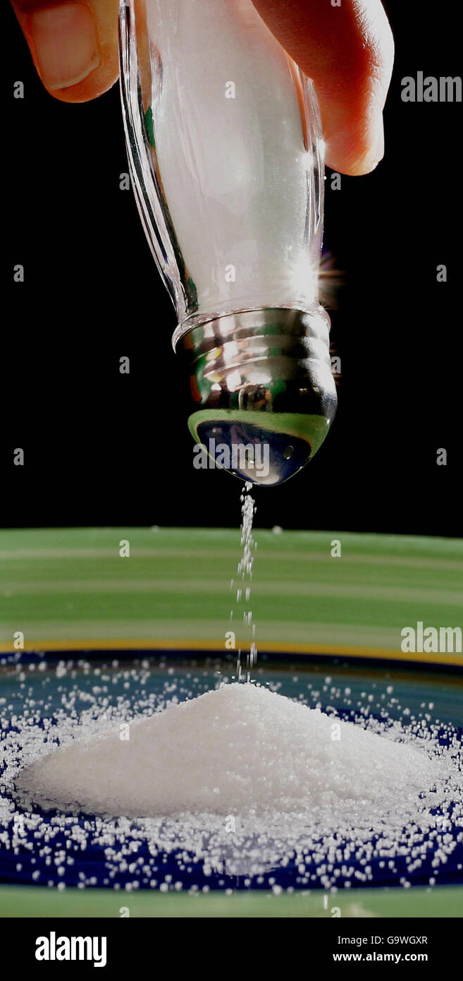 Salt poured from a salt cellar hi-res stock photography and images - Alamy
