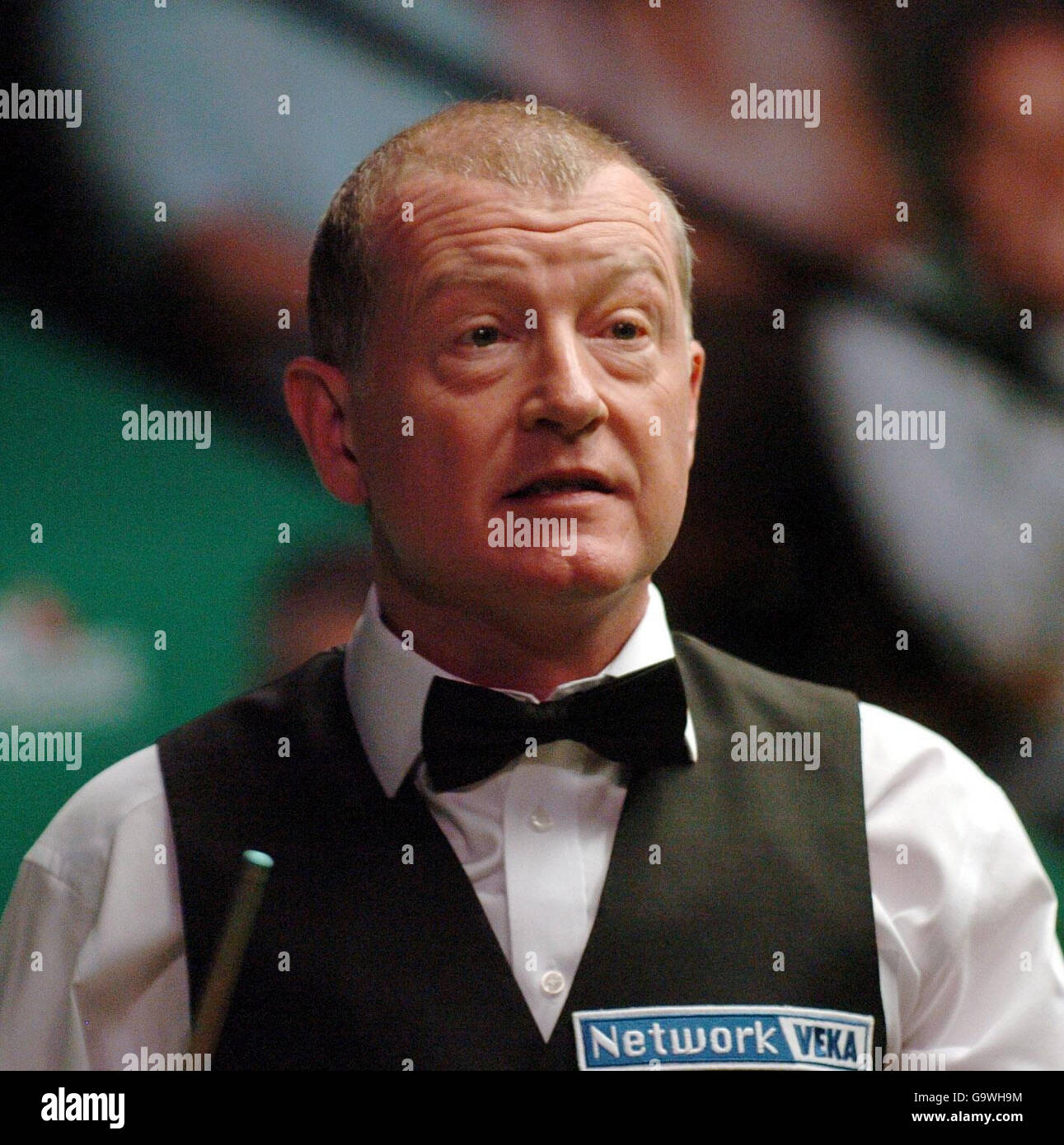 England's Steve Davis checks the scoreboard during their first round ...