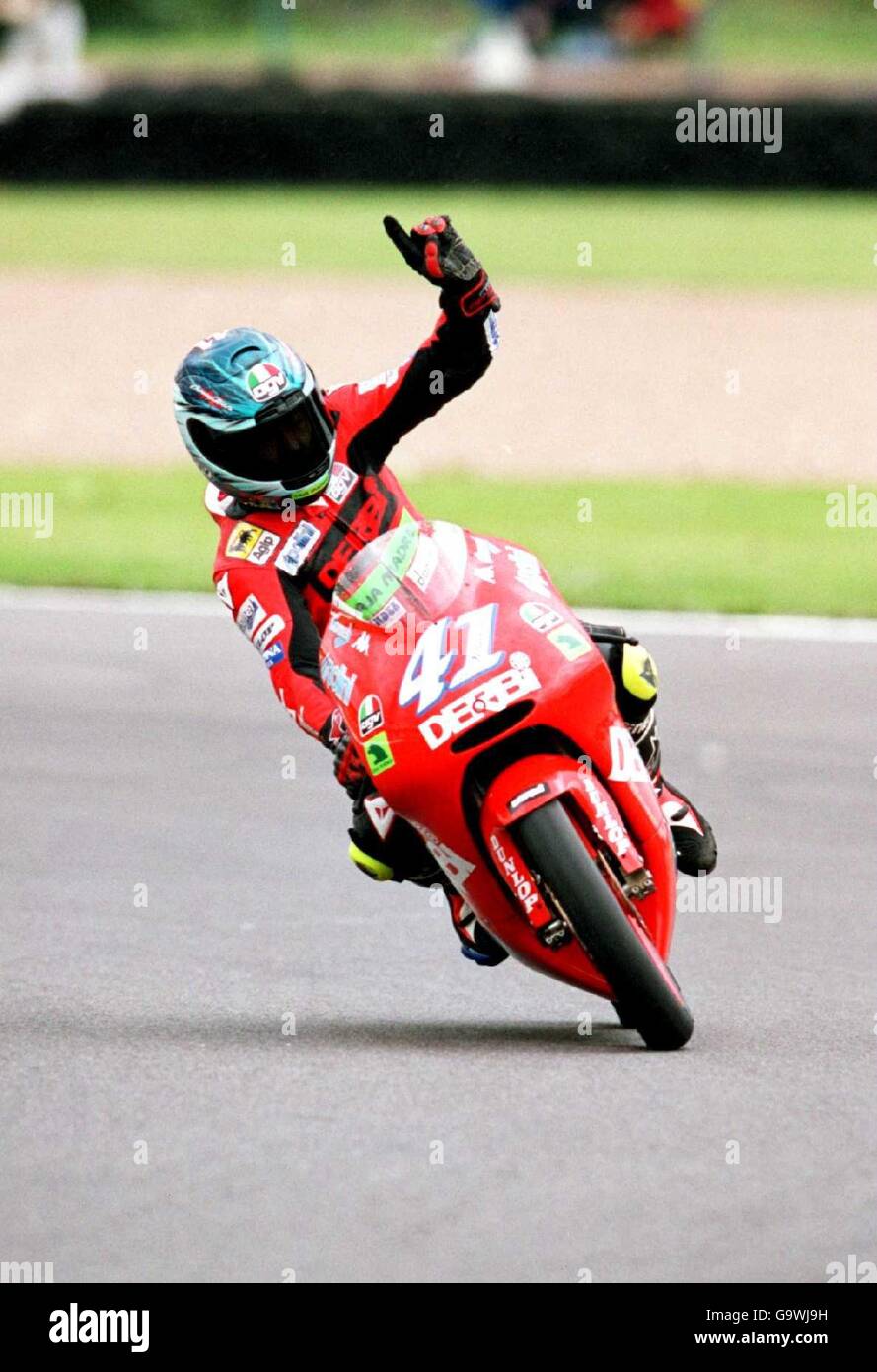 Youichi Ui, Derbi Racing, celebrates winning the Cinzano British Grand ...